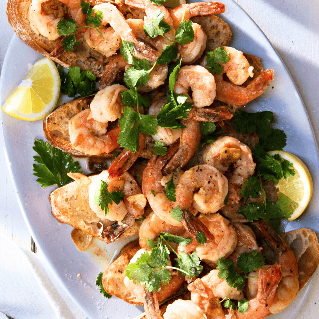 Shrimp with Anchovy Butter Over Garlicky Toast | Tastemade