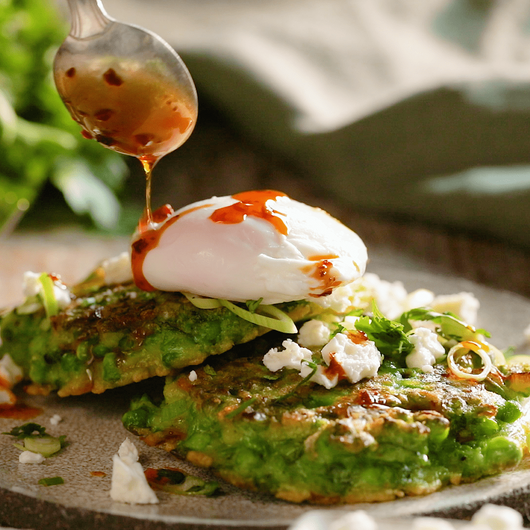 Smashed Pea Pancakes with Poached Eggs | Tastemade