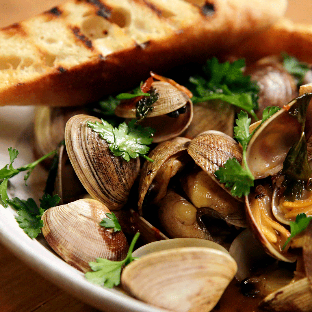 Spicy Italian Clam Bowl with Toasted Baguette | Tastemade