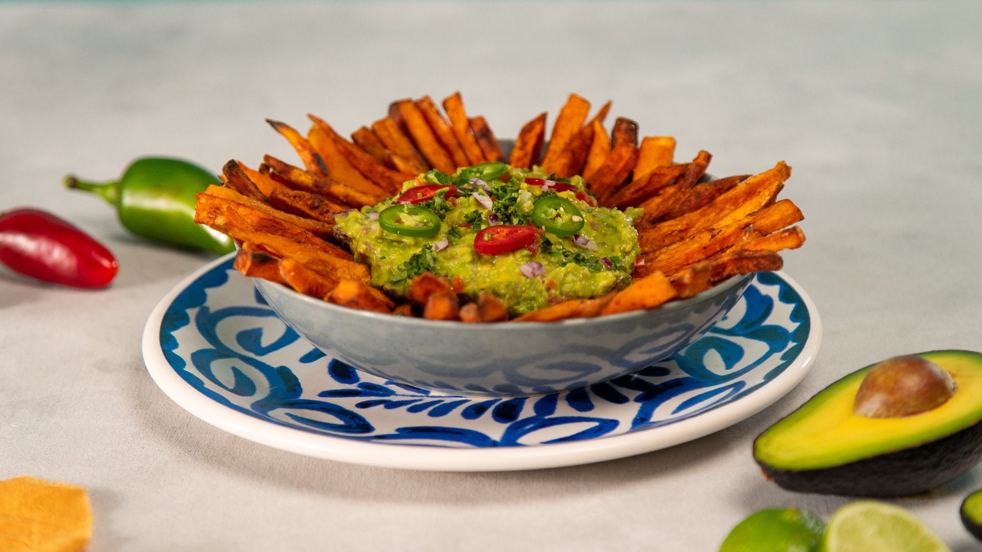 Loaded Spicy Guacamole with Sweet Potato Fries | Tastemade