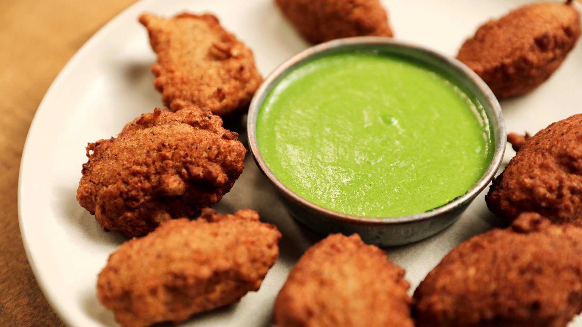 Black-Eyed Pea Fritters with Spicy Herb Sauce | Tastemade