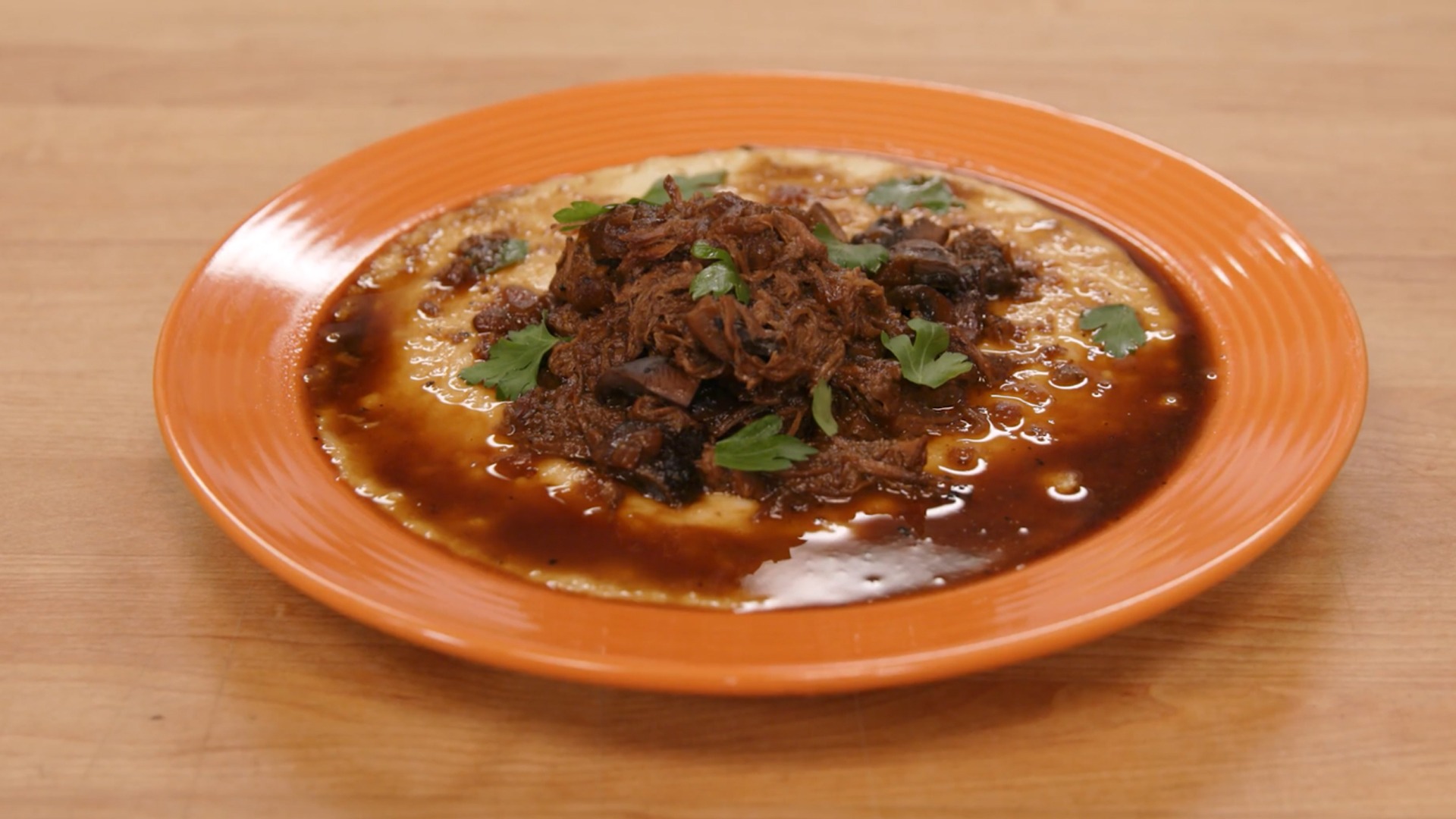 Braised Beef With Mushrooms Over Creamy Polenta | Tastemade